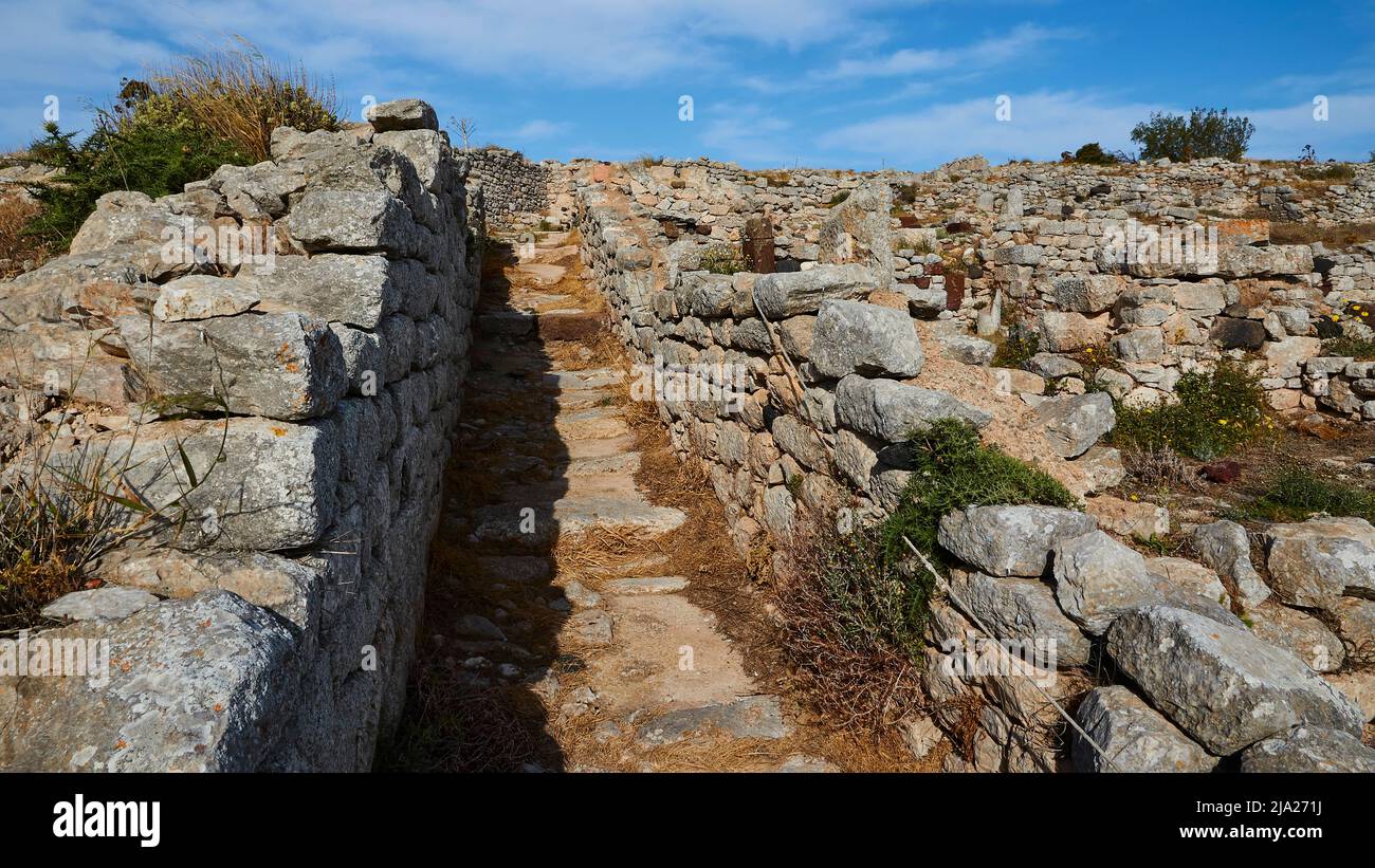 Ancient walls, hollow way, blue sky, white clouds, Old Thera, mountain ...