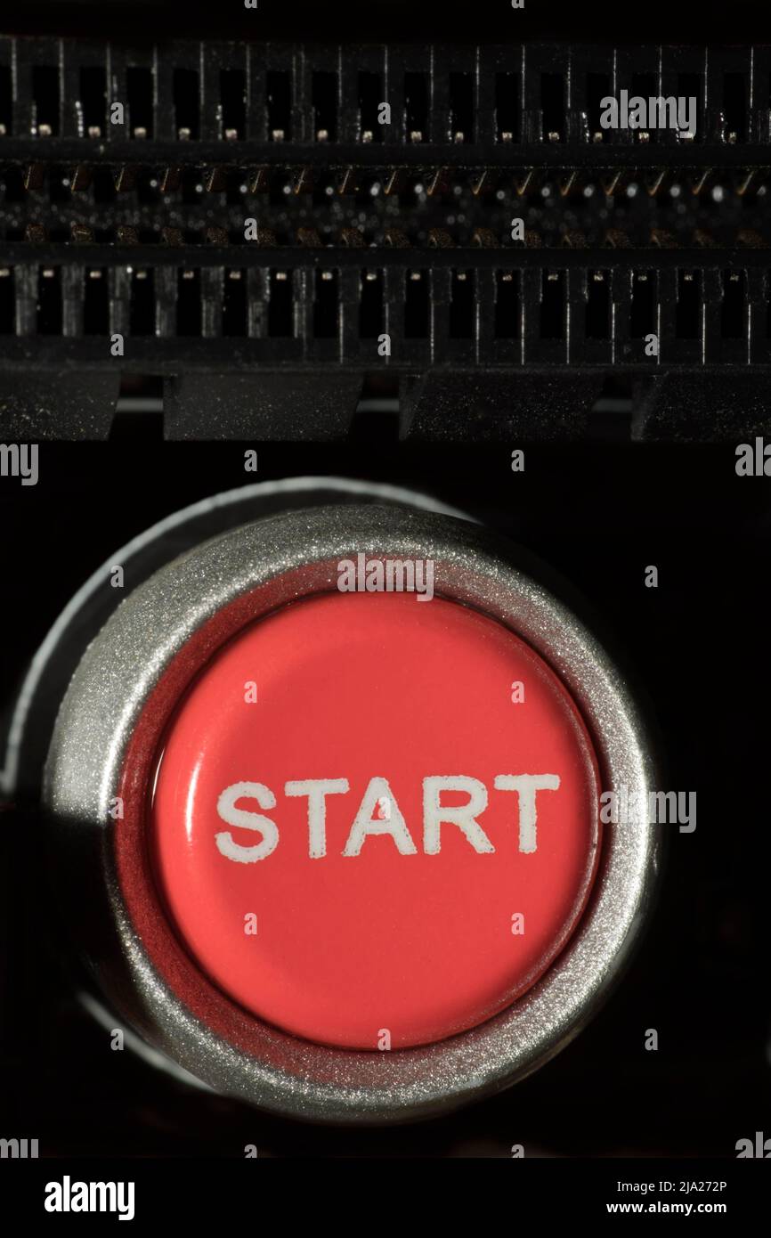 Symbol image, Red button with the inscription Start Stock Photo - Alamy