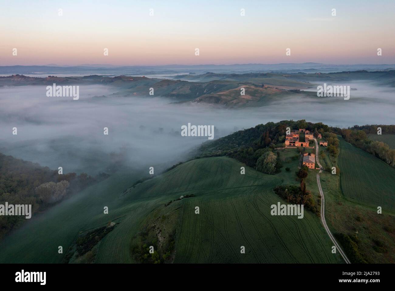 Aerial view, Hilly landscape with fog, Typical country house, Sunrise ...