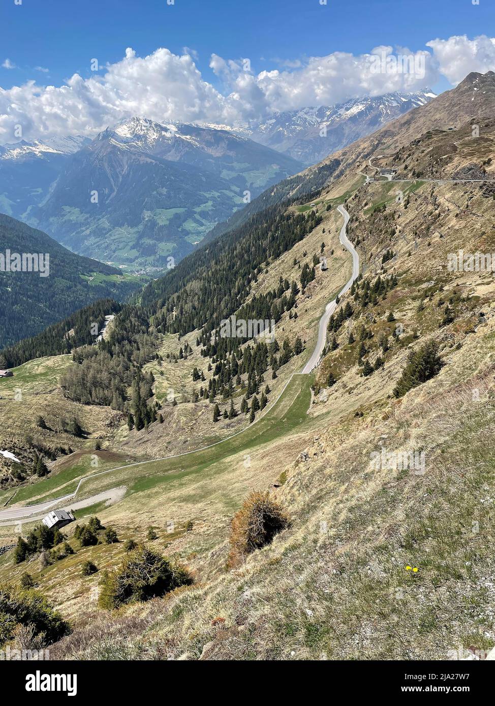 View from pass summit of mountain pass Jaufenpass to south ramp with ...