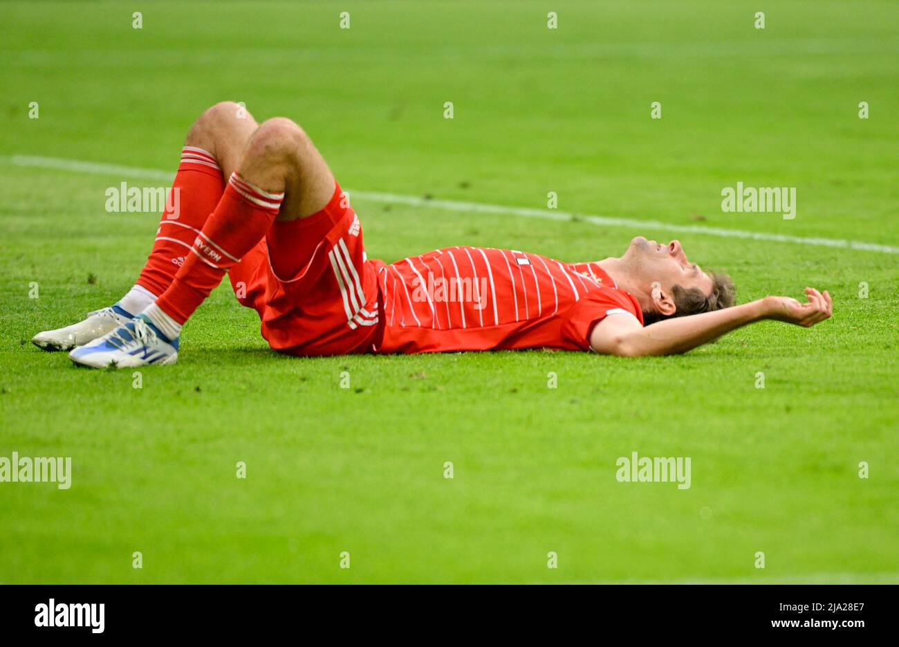 Thomas Mueller FC Bayern Munich FCB, lies disappointed on the ground ...