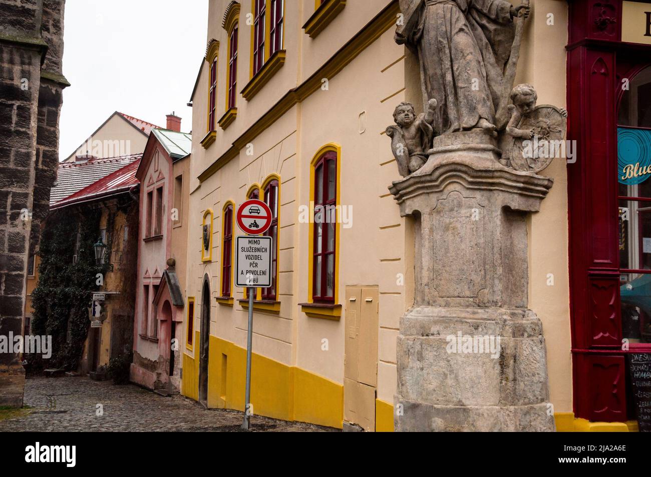 Baroque statue in a corner niche in the ancient in the medieval city of ...