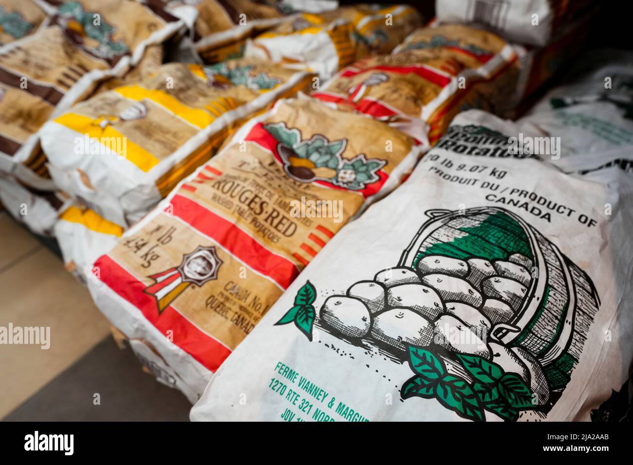 Canadian produced potatoes are displayed for sale at a grocery store in ...