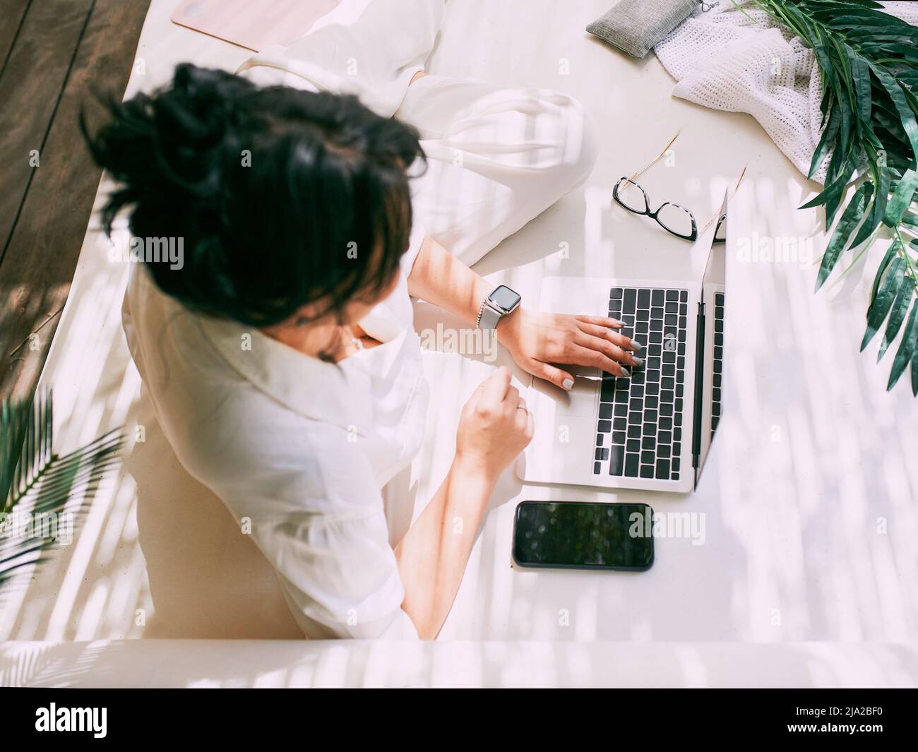 Beautiful woman entrepreneur freelancer work remotely. Top view ...