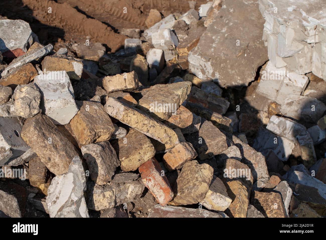 bricks and other building materials scattered on the territory after ...