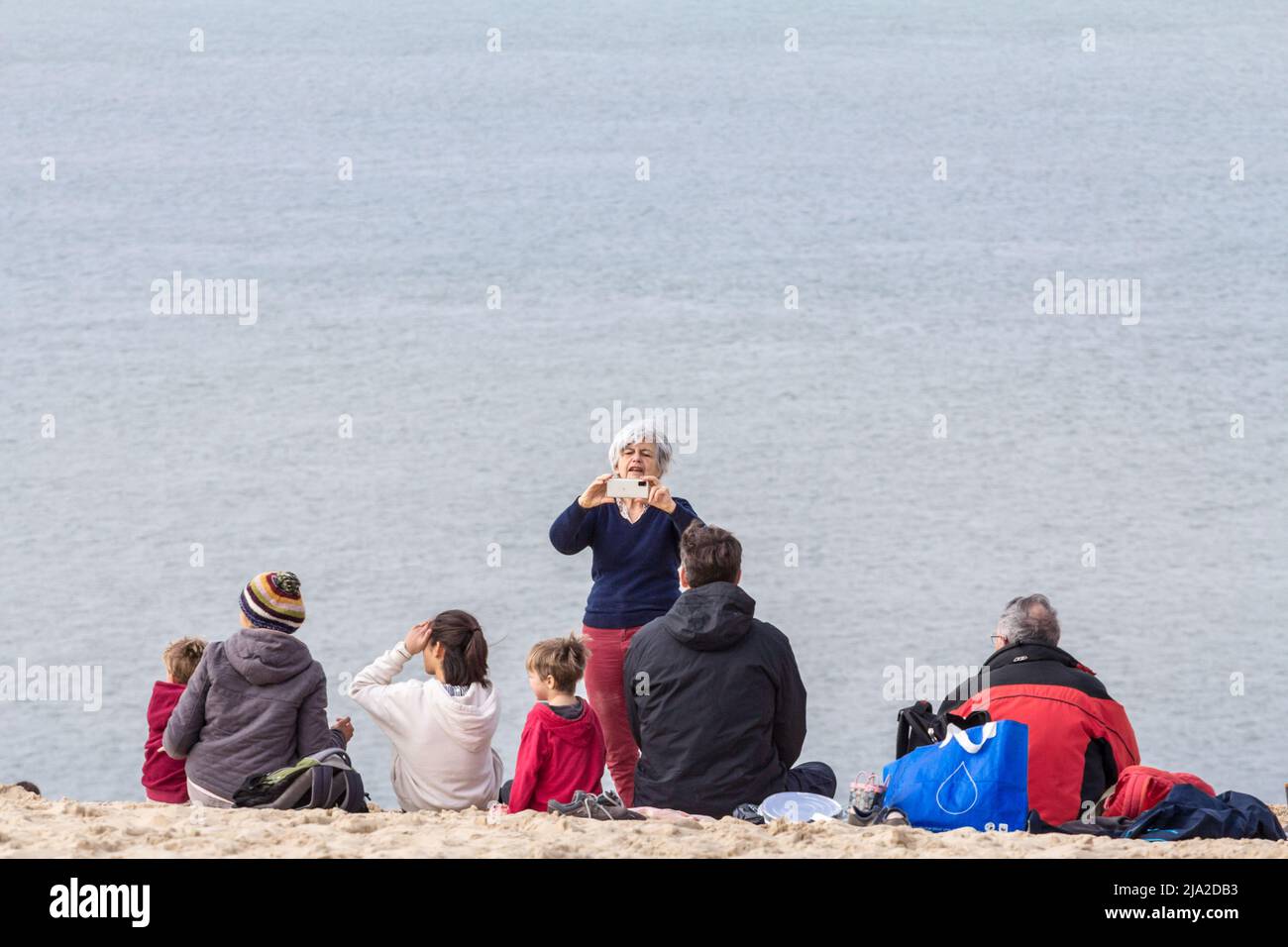 Picture of people, a family, taking a picture of the group family on ...
