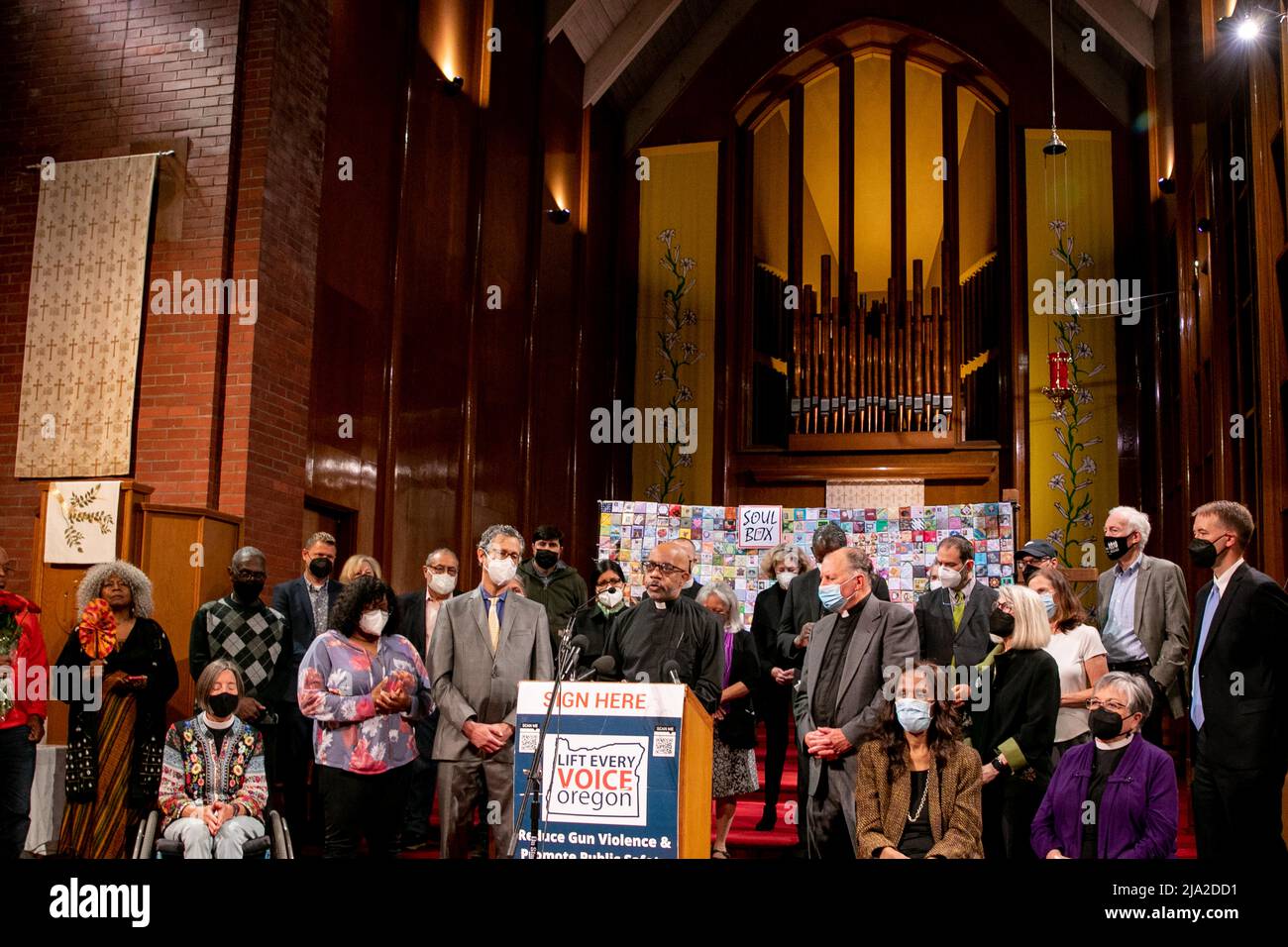 Rev. Cecil Prescod, of Ainsworth United Church of Christ, addresses the ...