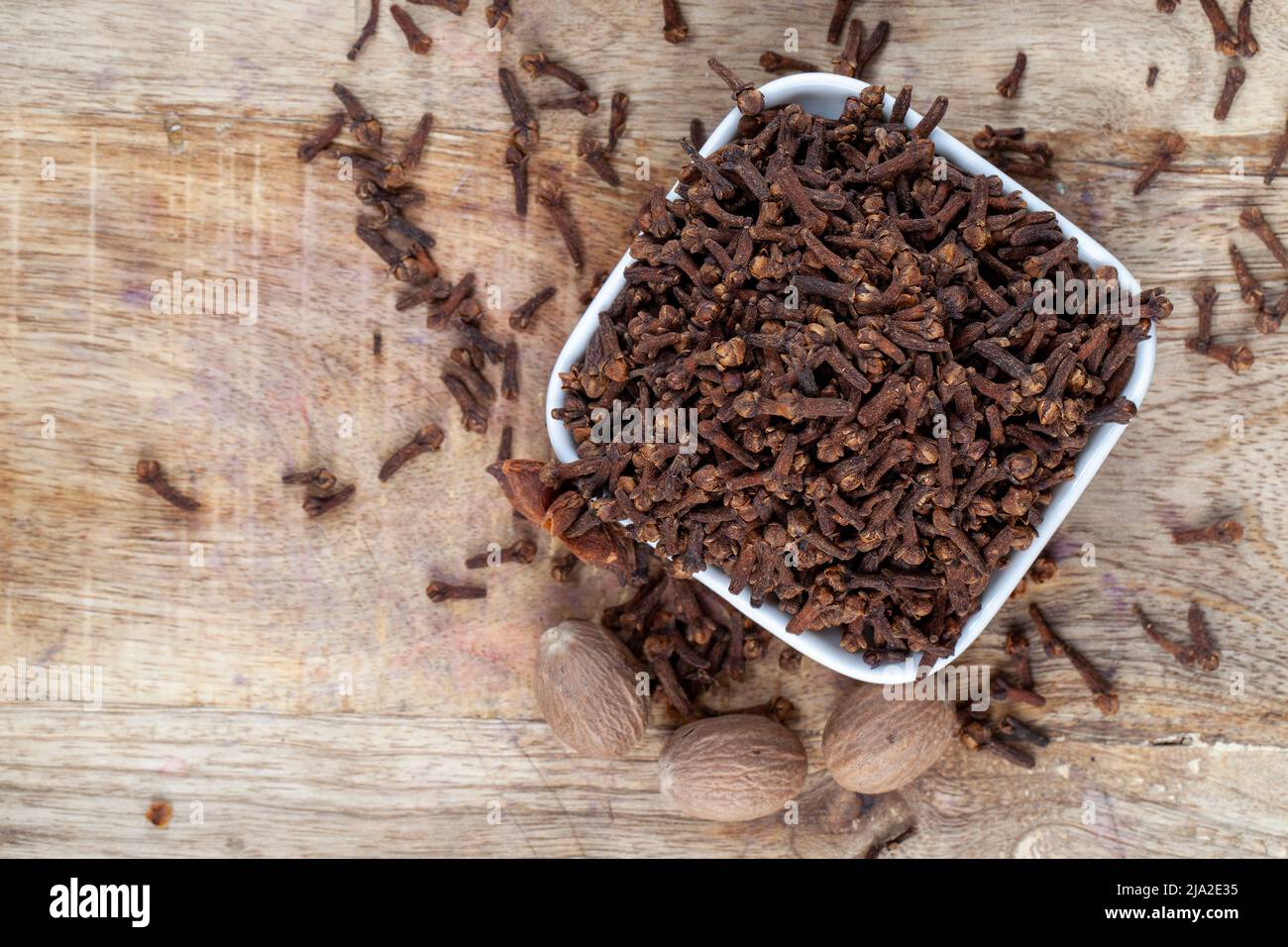 dried aromatic spices of cloves on the table, spices of cloves used for ...
