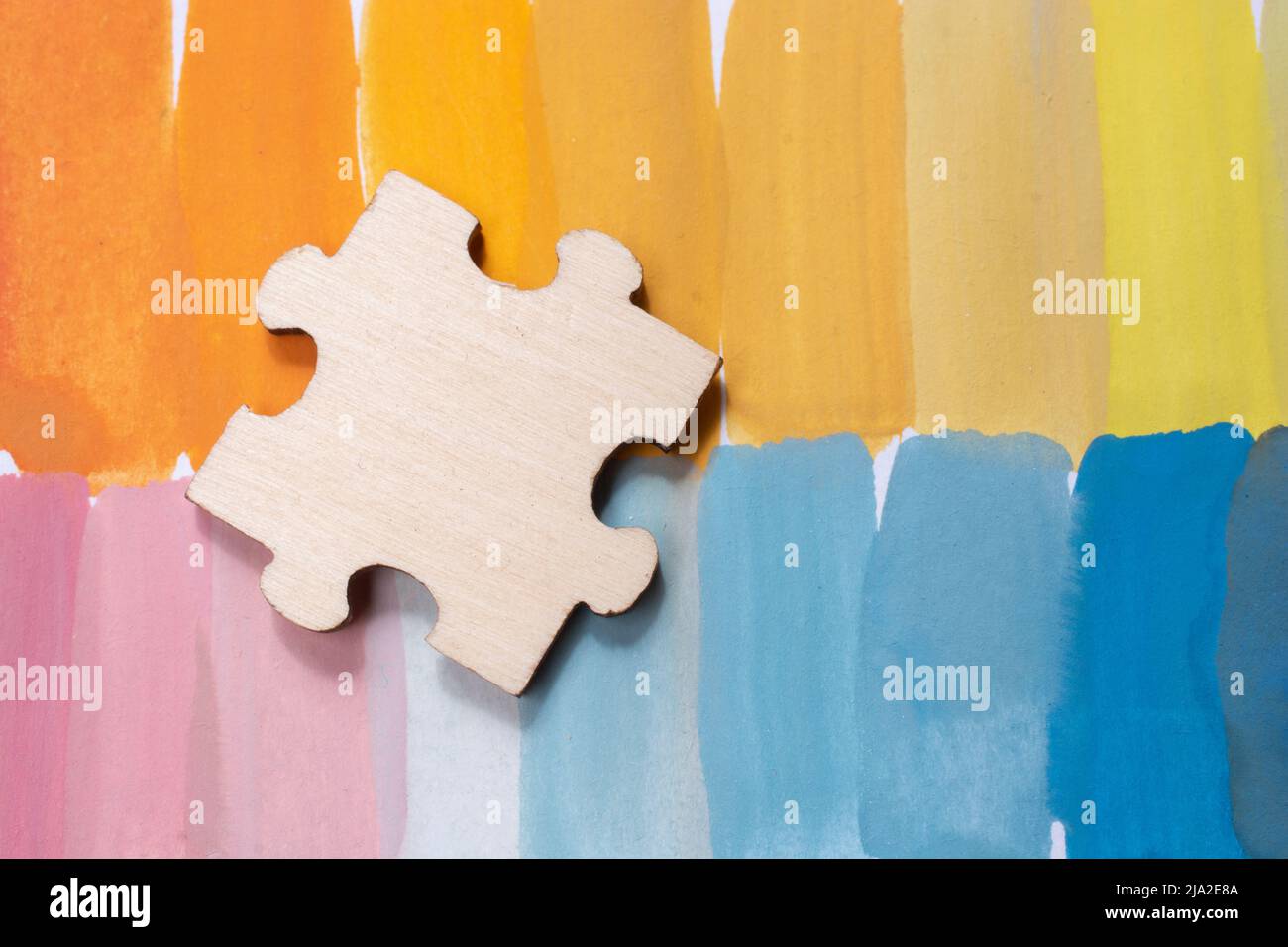 Puzzle piece on Color grunge brushes. Watercolor paint linear strokes ...
