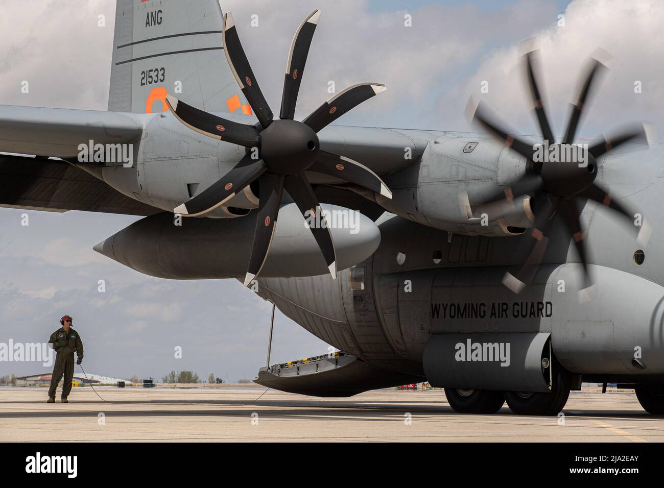 A C-130 loadmaster from the 153d Airlift Wing equipped with USDA Forest ...
