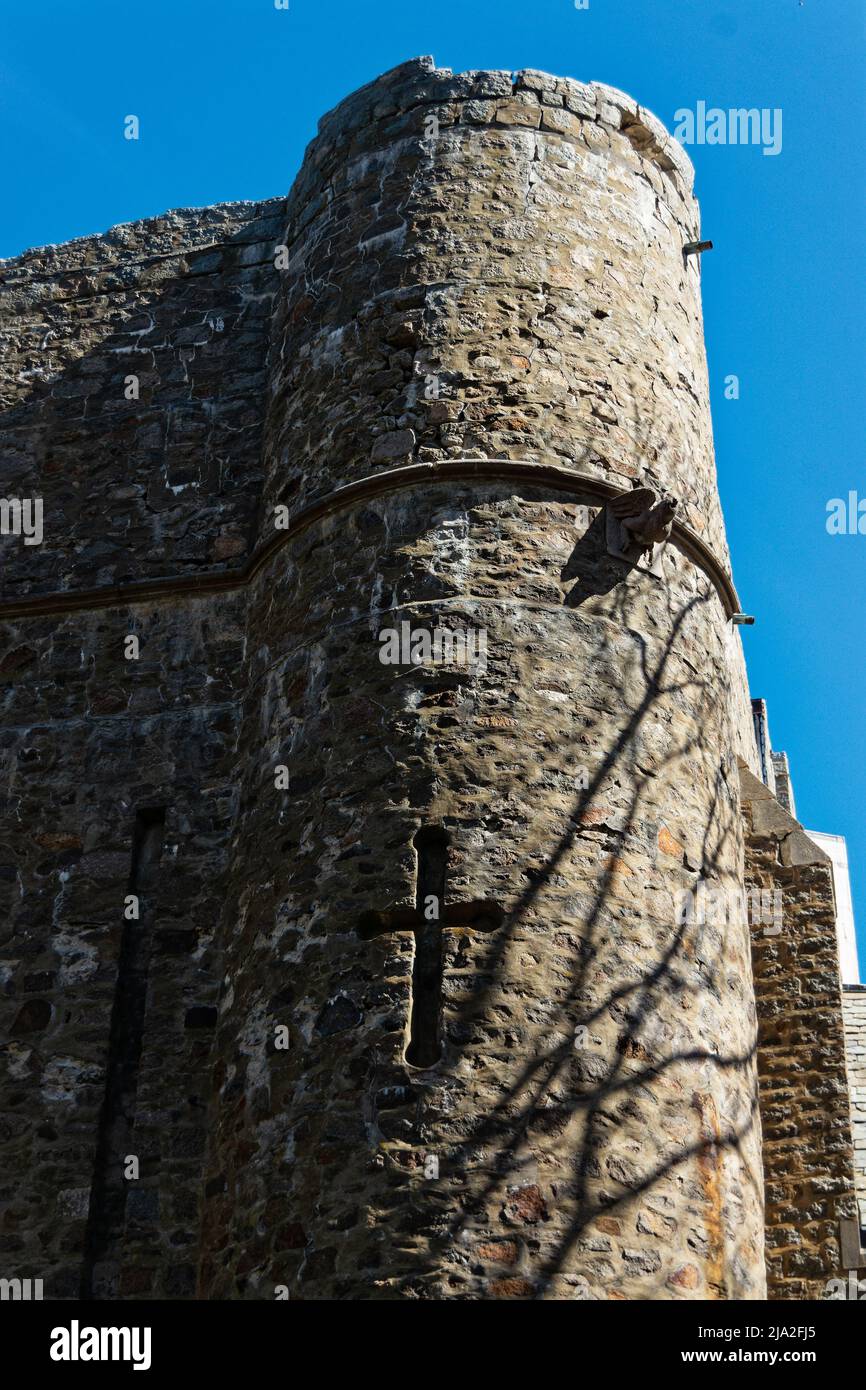 A stone castle tower with cross visible in the lower third at the 1926 ...