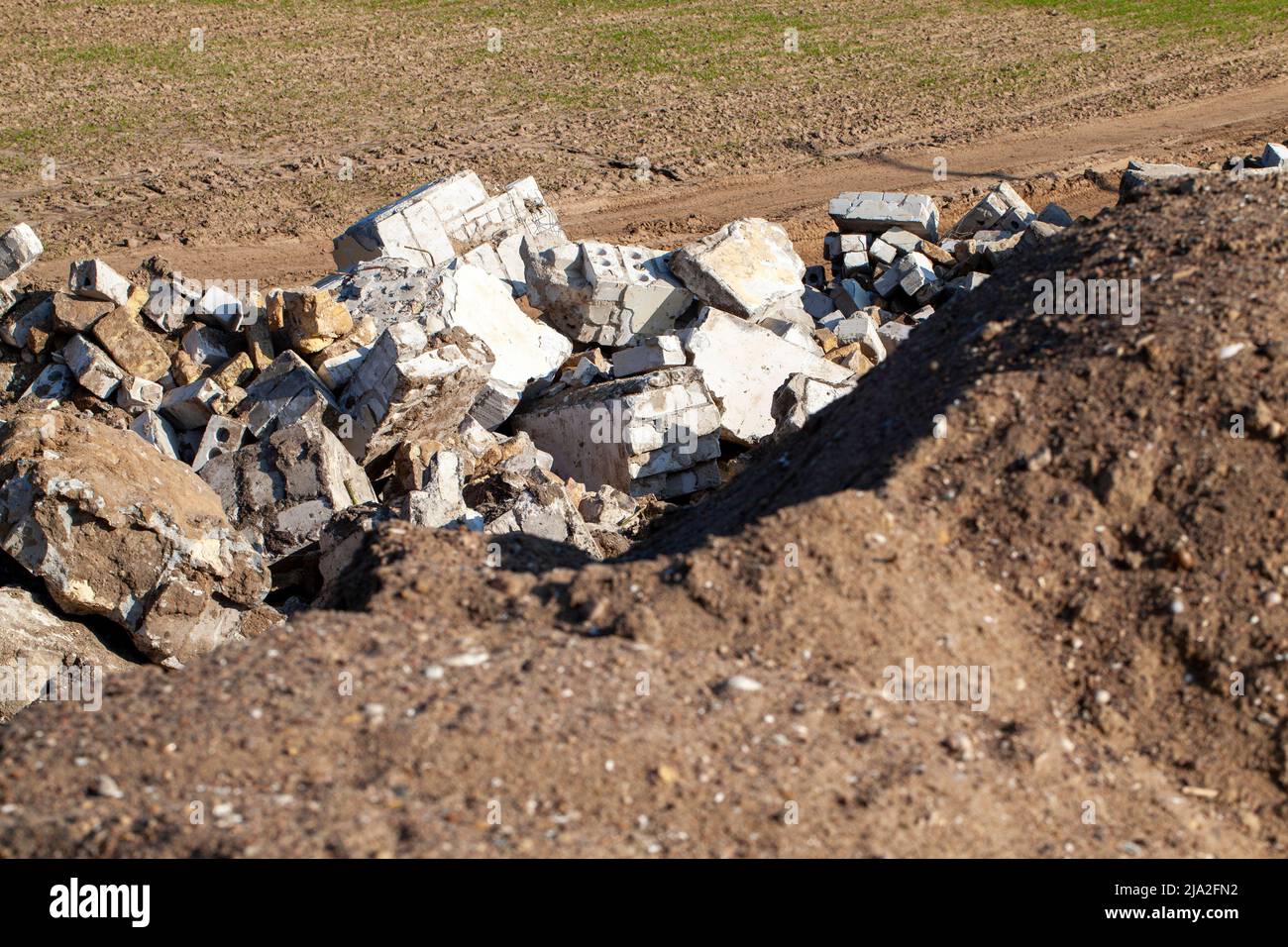 bricks and other building materials scattered on the territory after ...
