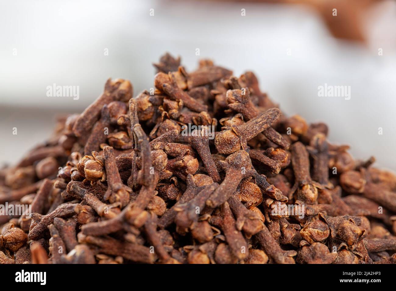 dried aromatic spices of cloves on the table, spices of cloves used for ...