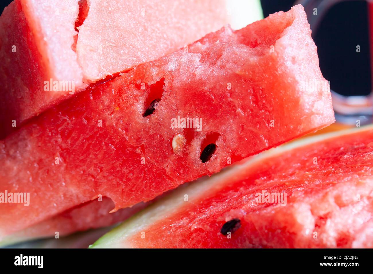 sliced red ripe watermelon during meals, red watermelon berry in pieces ...