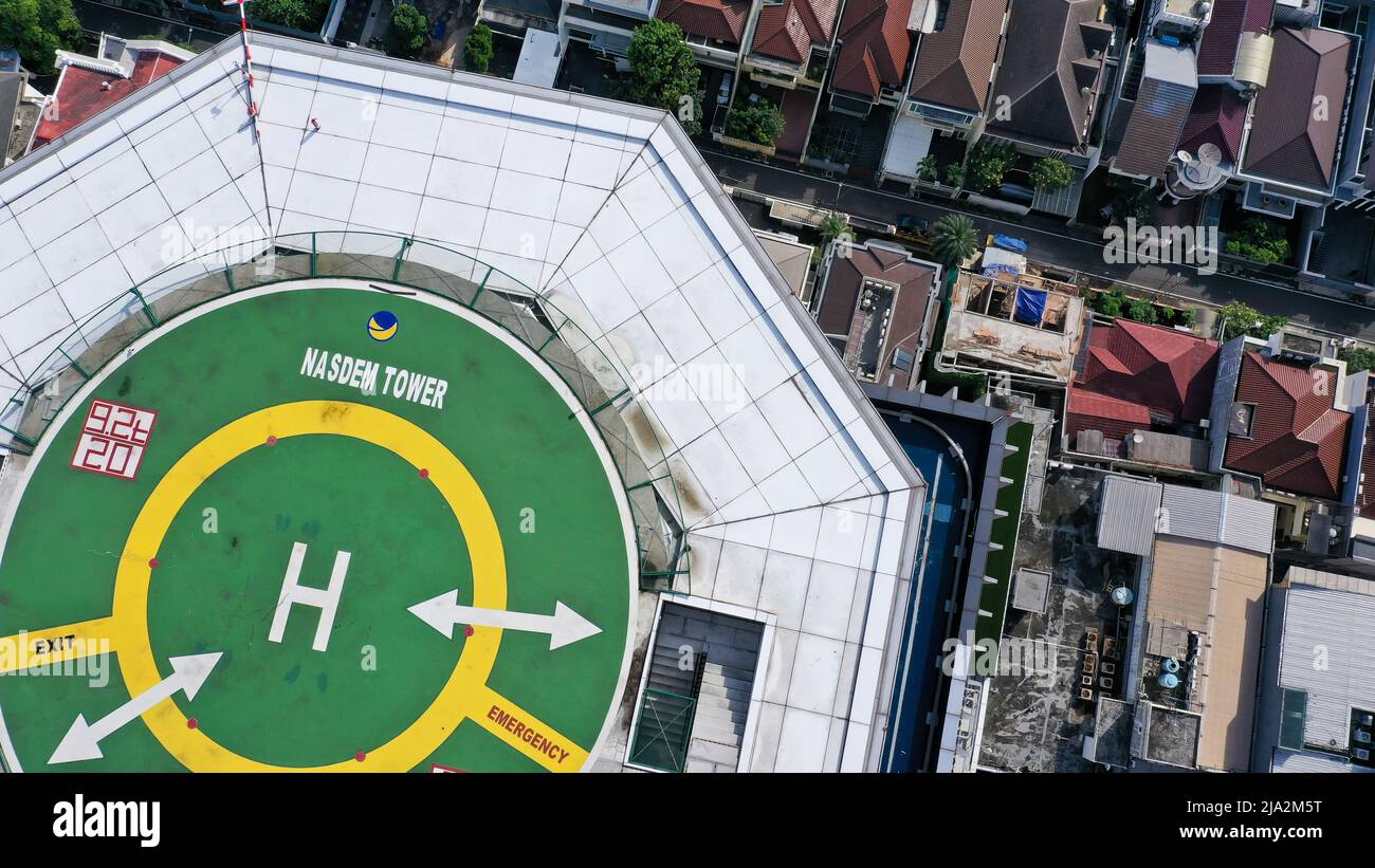 Top down close up view of helicopter landing pad on the roof of modern ...