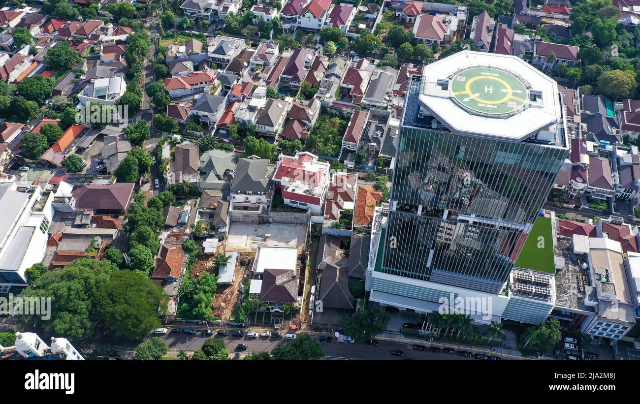 Aerial view of helipad on the roof of modern skyscraper in Jakarta city ...