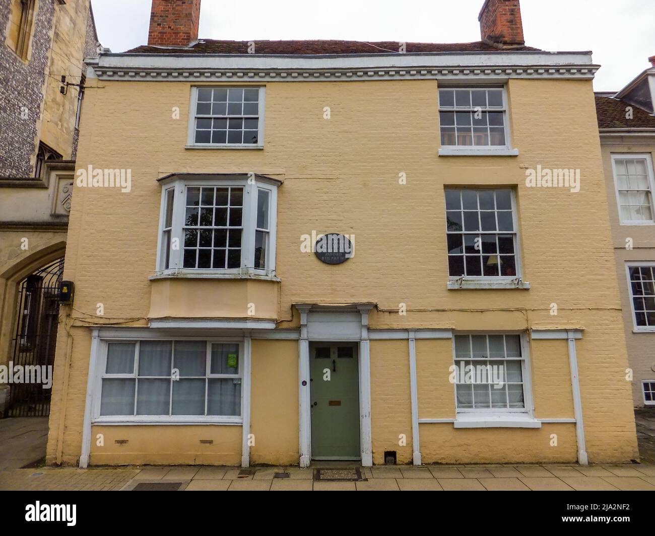 This yellow three-story house in Winchester, Hampshire, England, UK ...
