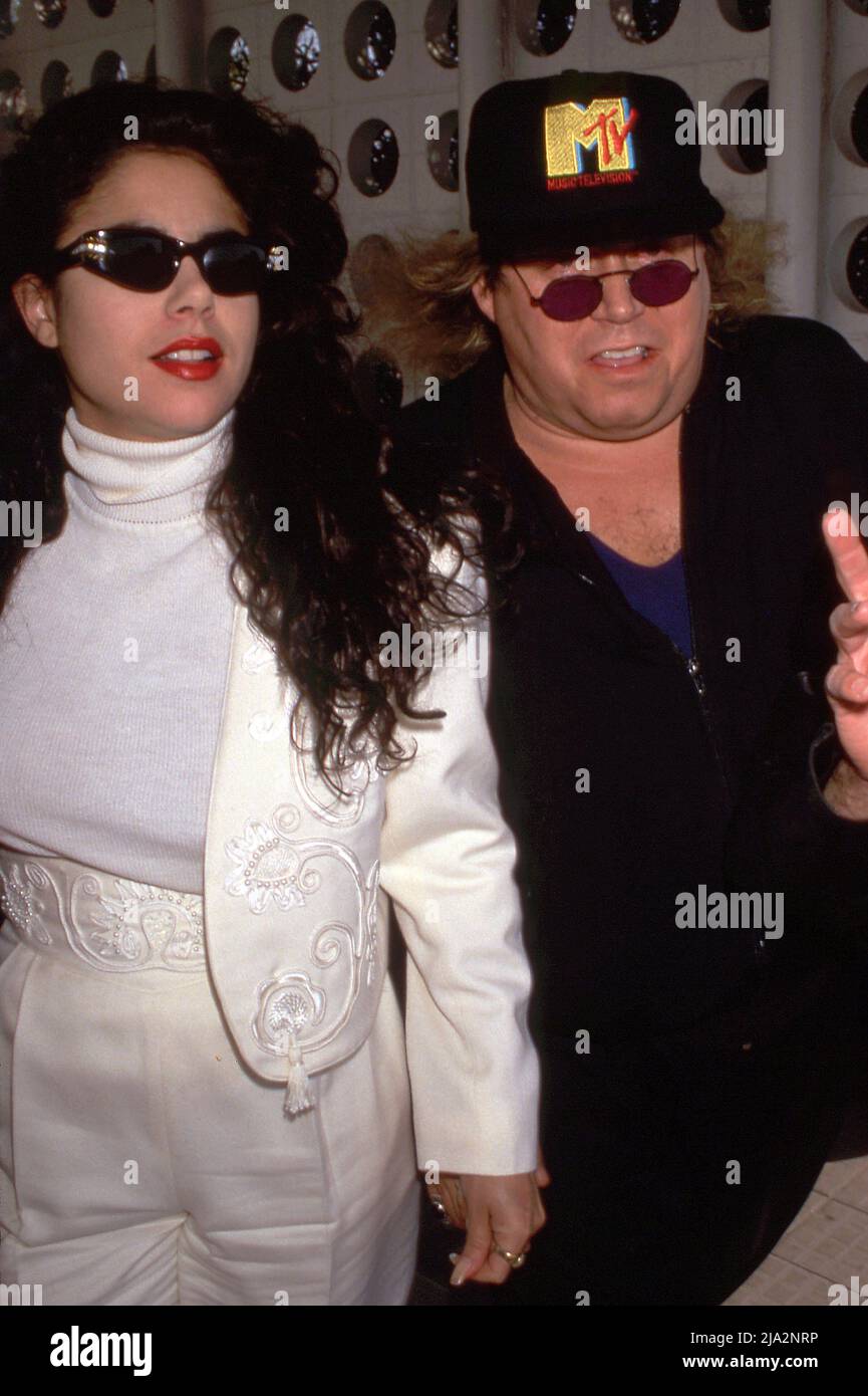Sam Kinison and Malika Souiri 1992 Credit: Ralph Dominguez/MediaPunch ...