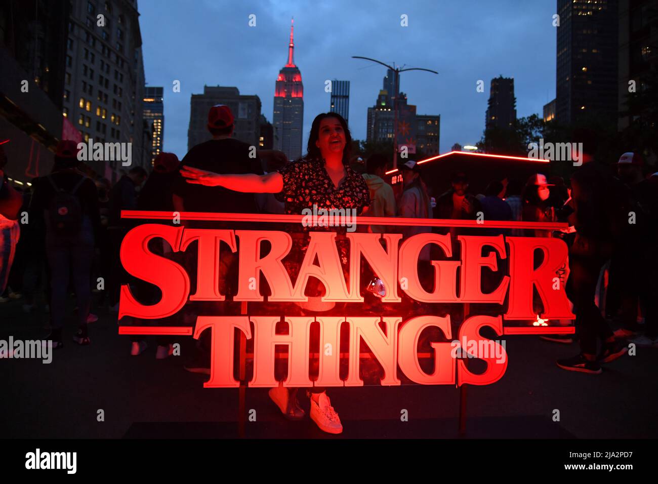 Scenes from the television show 'Stranger Things' are projected on the ...