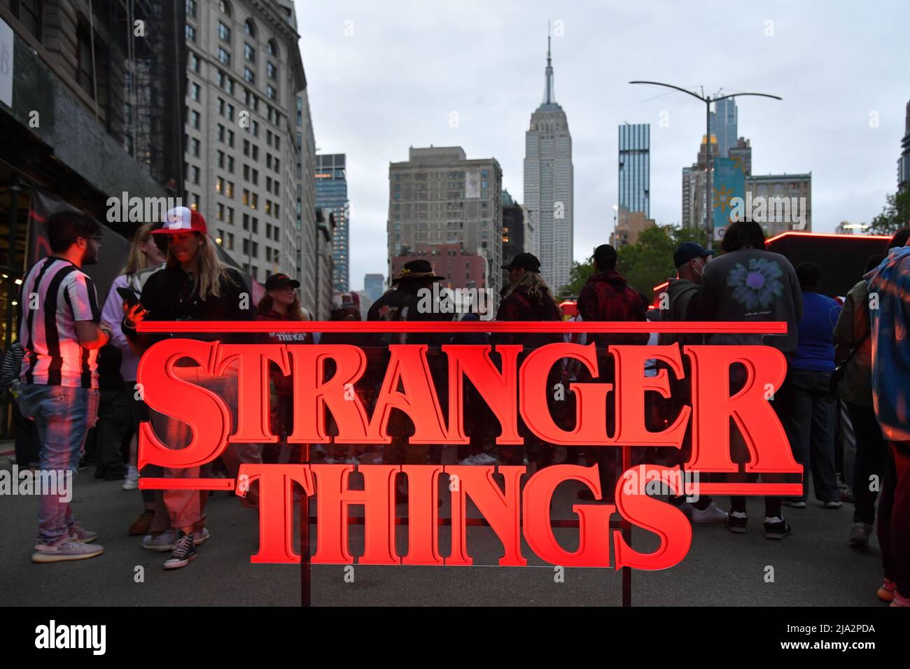 Scenes from the television show 'Stranger Things' are projected on the ...