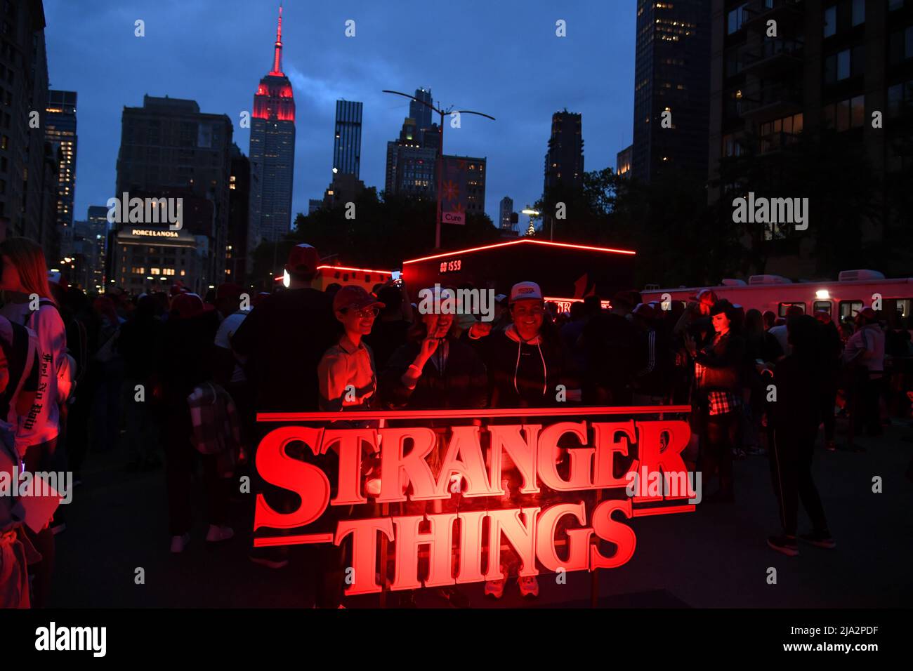 Scenes from the television show 'Stranger Things' are projected on the ...