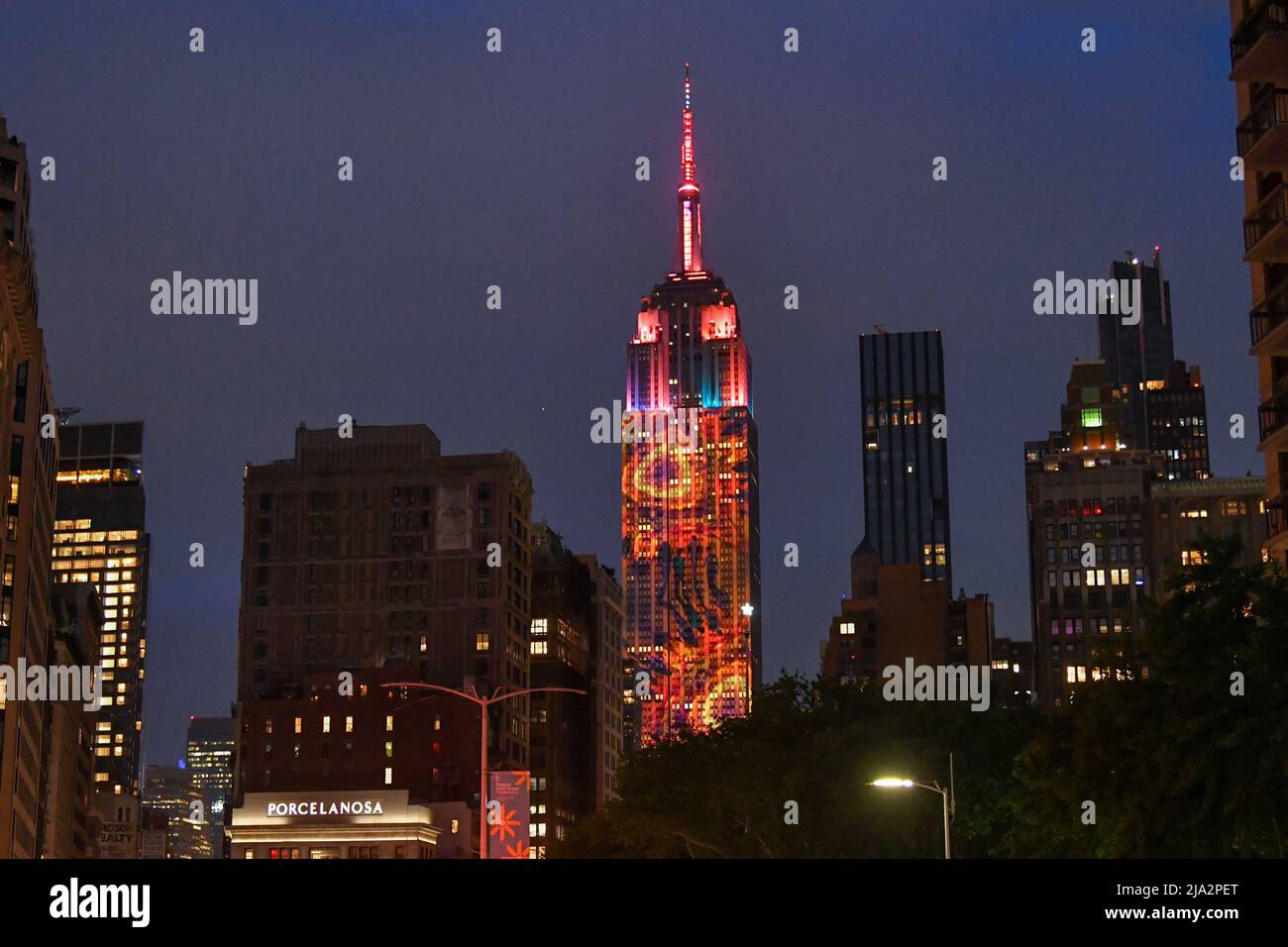 Scenes from the television show 'Stranger Things' are projected on the ...