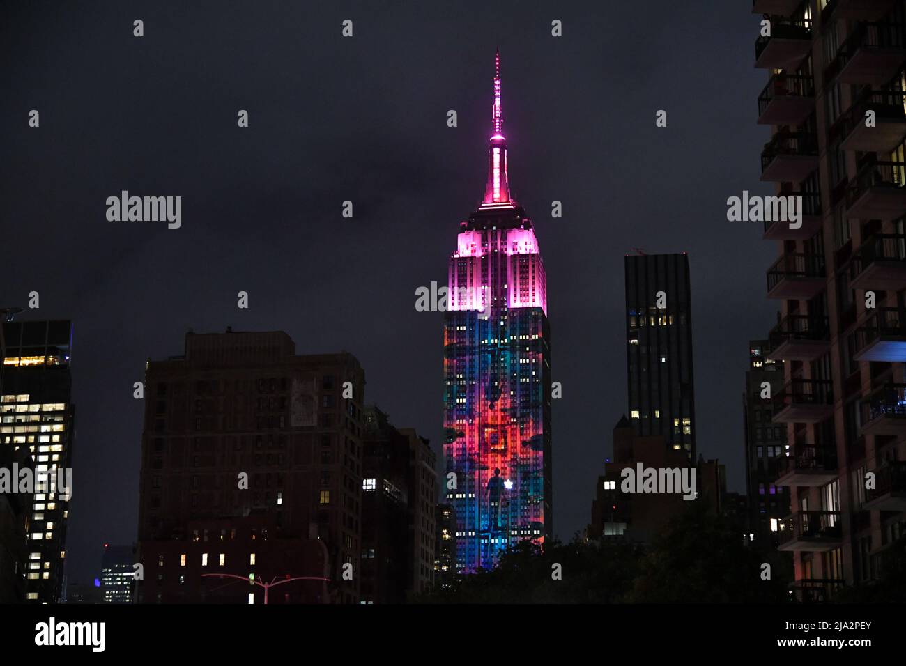 Scenes from the television show 'Stranger Things' are projected on the ...