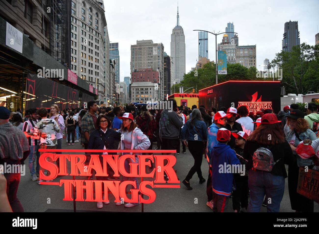 Scenes from the television show 'Stranger Things' are projected on the ...
