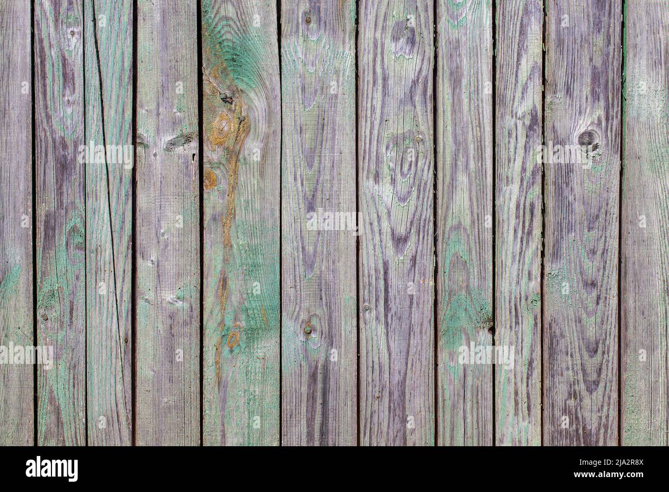 an old wooden surface with a number of damages, an old surface made of ...