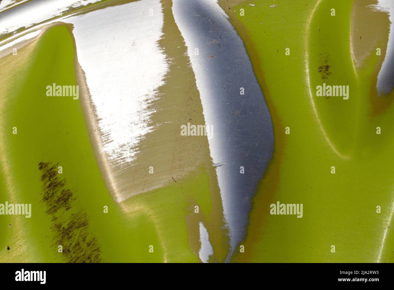 metal surface with paint worn off from work, part of the plow for ...