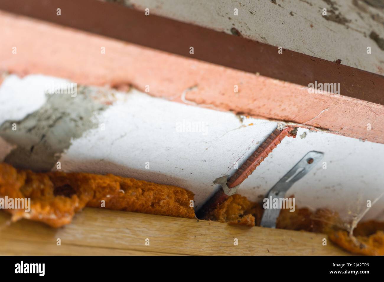 The window opening is reinforced with an iron corner and fittings Stock ...