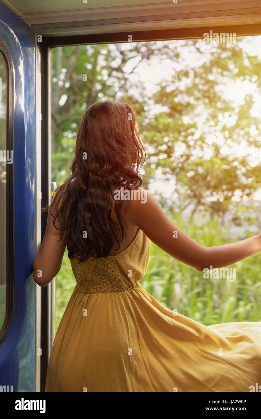 Woman standing train back view hi-res stock photography and images - Alamy