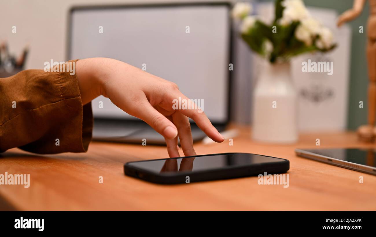 Close-up, A female touching on smartphone screen, using mobile phone ...