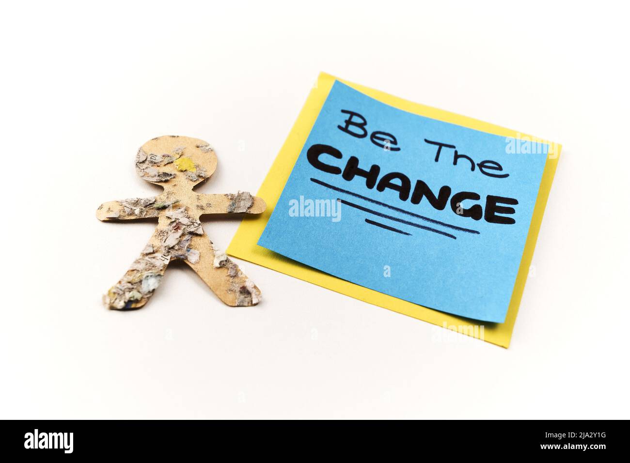 Recycled paper person cutout; environment concept, be the change ...