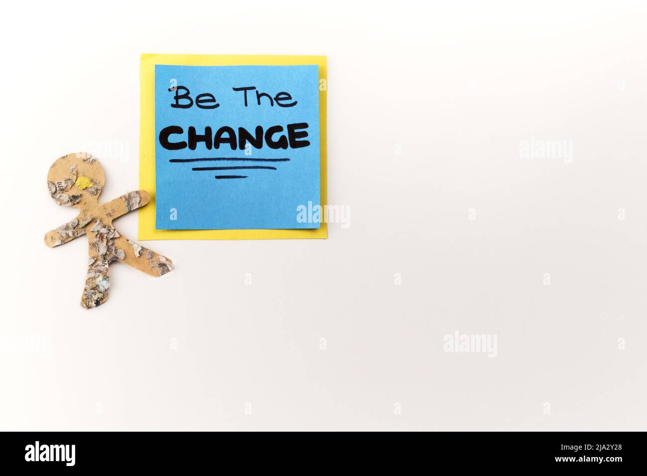 Recycled paper person cutout; environment concept, be the change ...