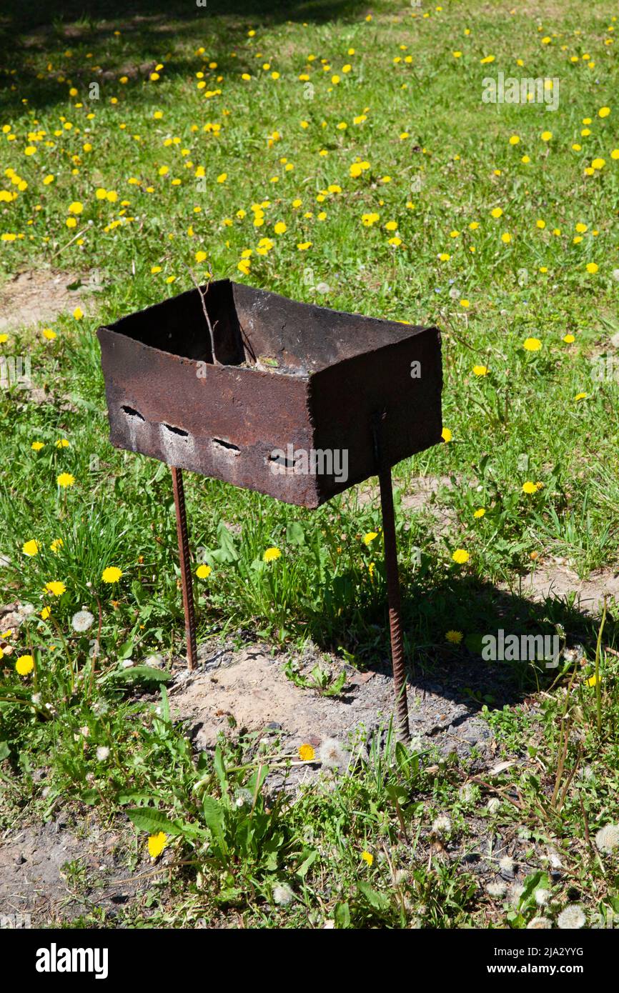 old metal barbecue grill for cooking kebabs, used in the east metal ...