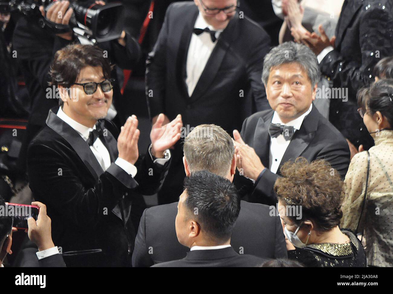Cannes, France, on May 26, 2022, Japanese film director Hirokazu Koreeda (R) and South Korean ...