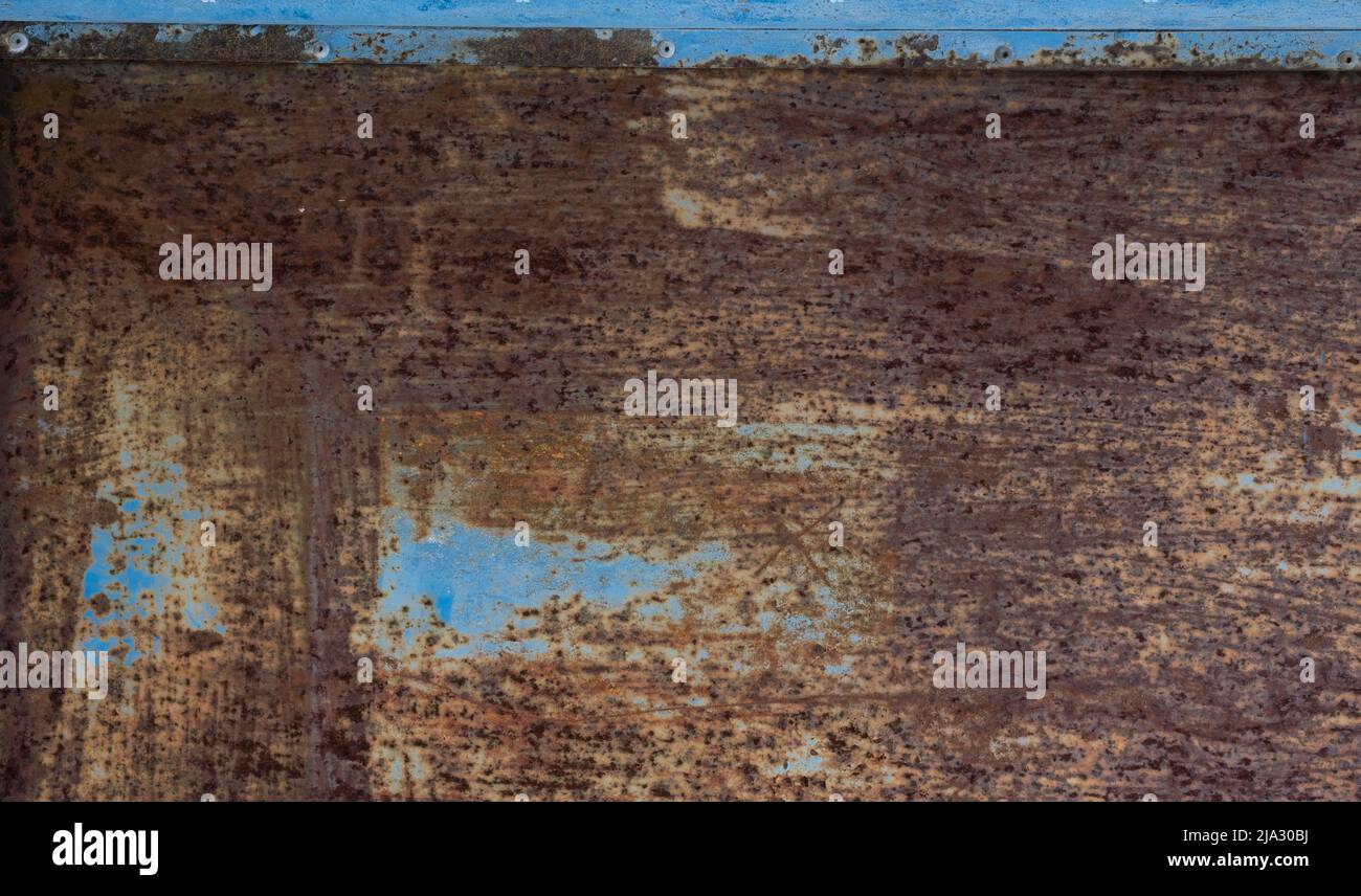 Corroded and rusted blue sheet of metal Stock Photo - Alamy