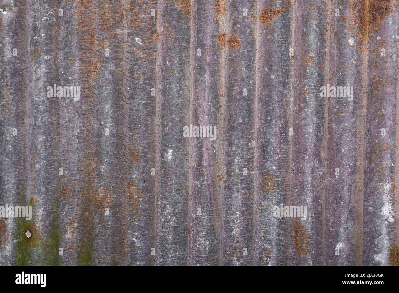 Corrugated metal roofing panel with rust Stock Photo - Alamy