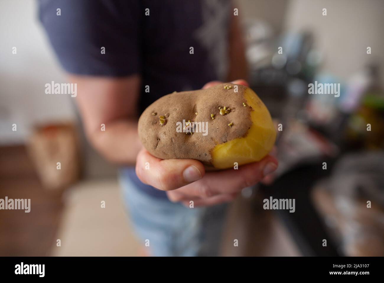 Partially peeled potato hi-res stock photography and images - Alamy