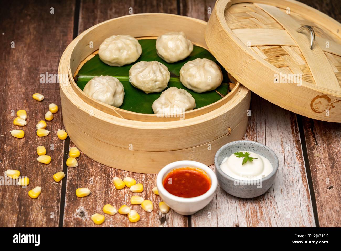 Chinese Steamed Momo with Chutney and Mayo Stock Photo - Alamy