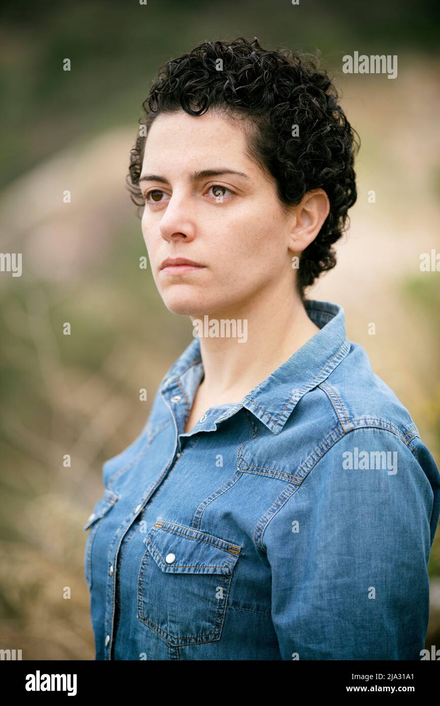 Beautiful woman looking away Stock Photo - Alamy