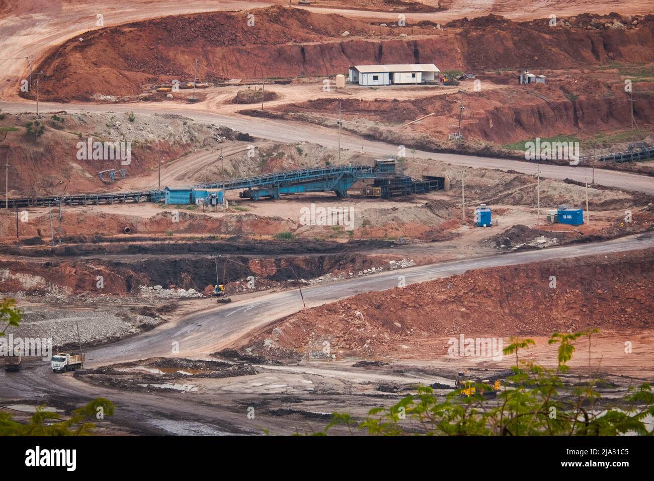 View of Trucks and excavators work in open pits in lignite coal mines ...