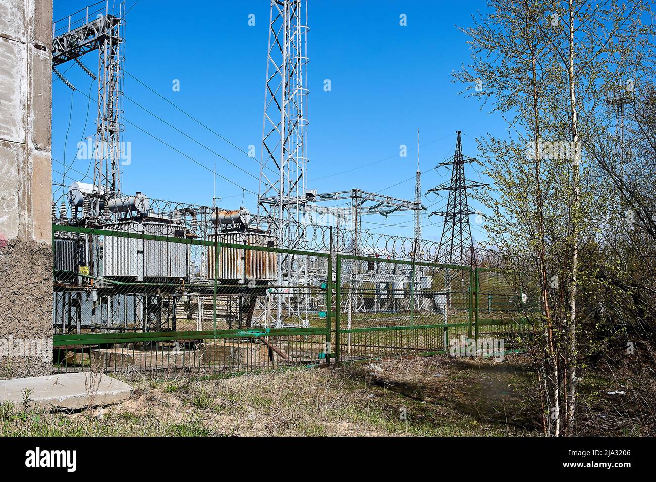 high-voltage electrical substation against the blue sky Stock Photo - Alamy