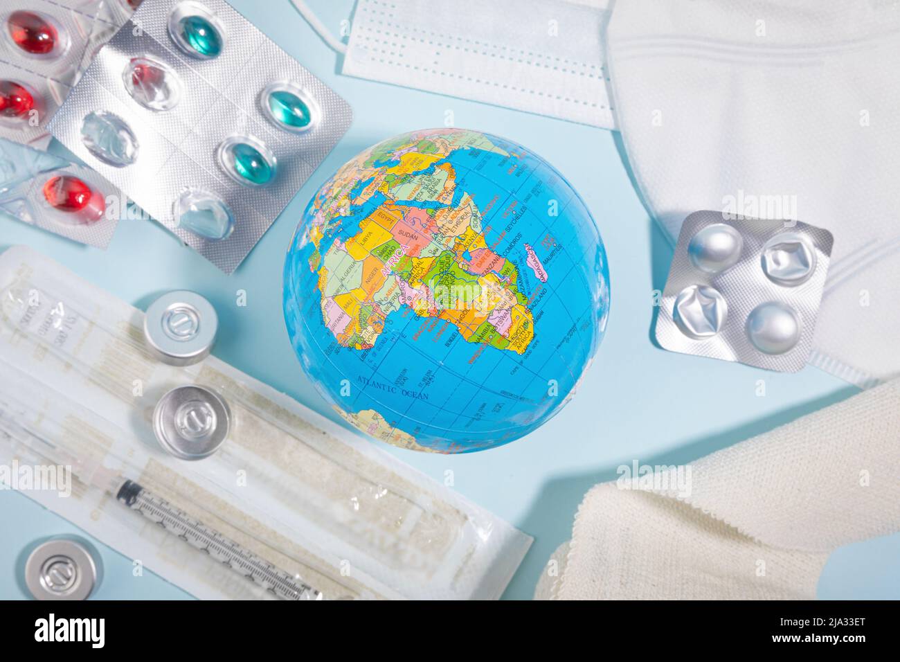 protect earth and environment concept, globe and pill, syringe, mask ...