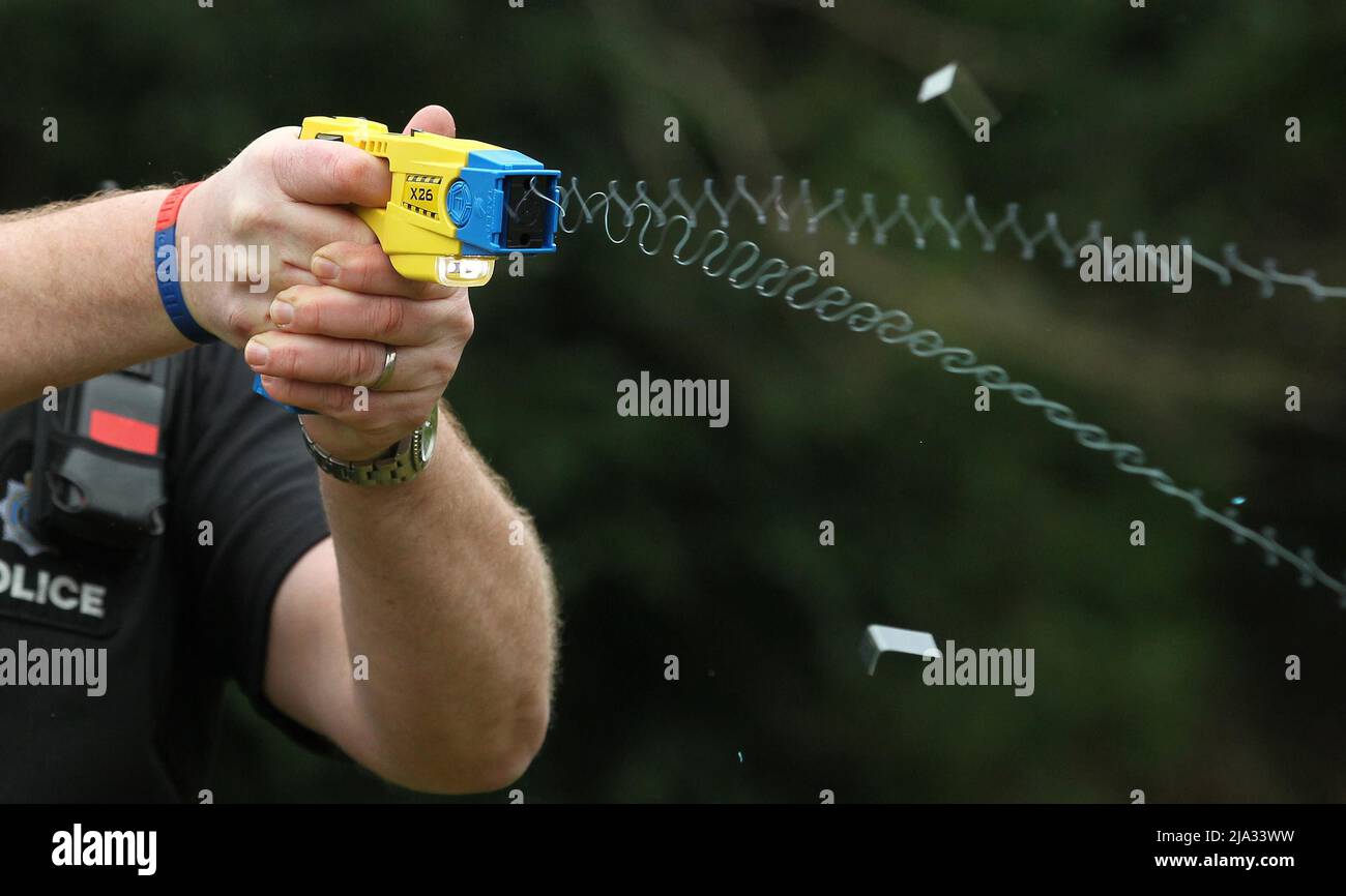 File photo 26/02/13 of a police officer demonstrating the use of a ...