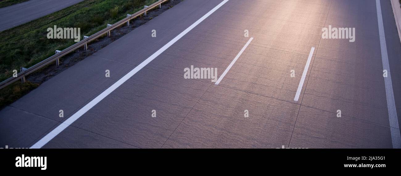 Autobahn in Germany at dusk Stock Photo - Alamy