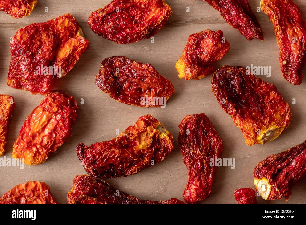 Slices of sun-dried tomatoes, top view Stock Photo - Alamy