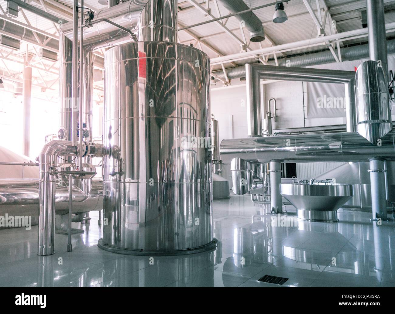 Modern interior of a brewery mash vats metal containers Stock Photo - Alamy