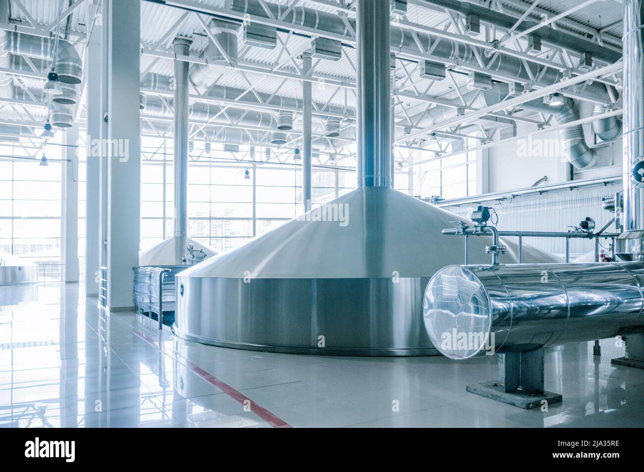 Modern interior of a brewery mash vats metal containers Stock Photo - Alamy